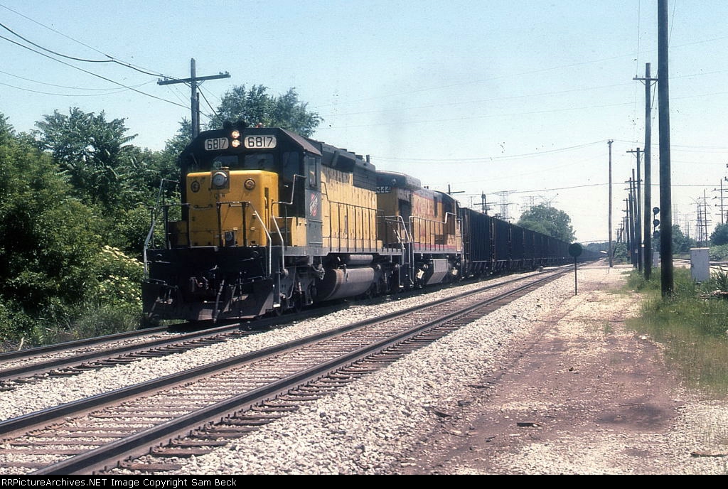 CNW 6817 and UP 2444